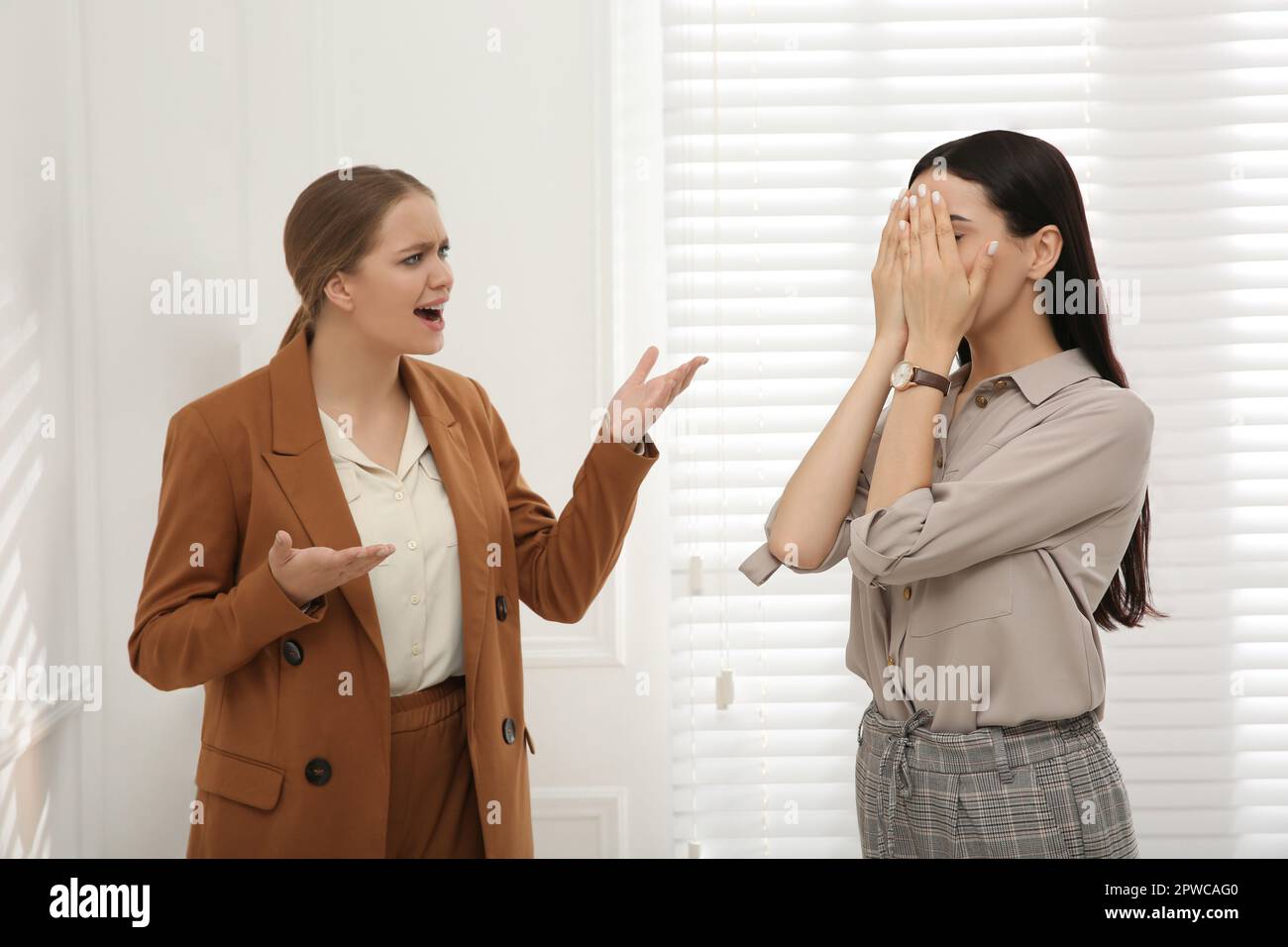 Boss screaming at employee in office. Toxic work environment Stock ...
