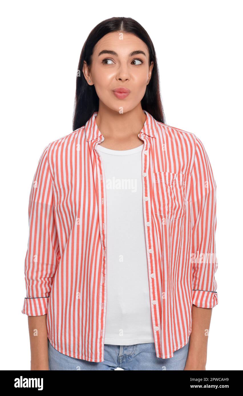 Embarrassed young woman in shirt on white background Stock Photo - Alamy