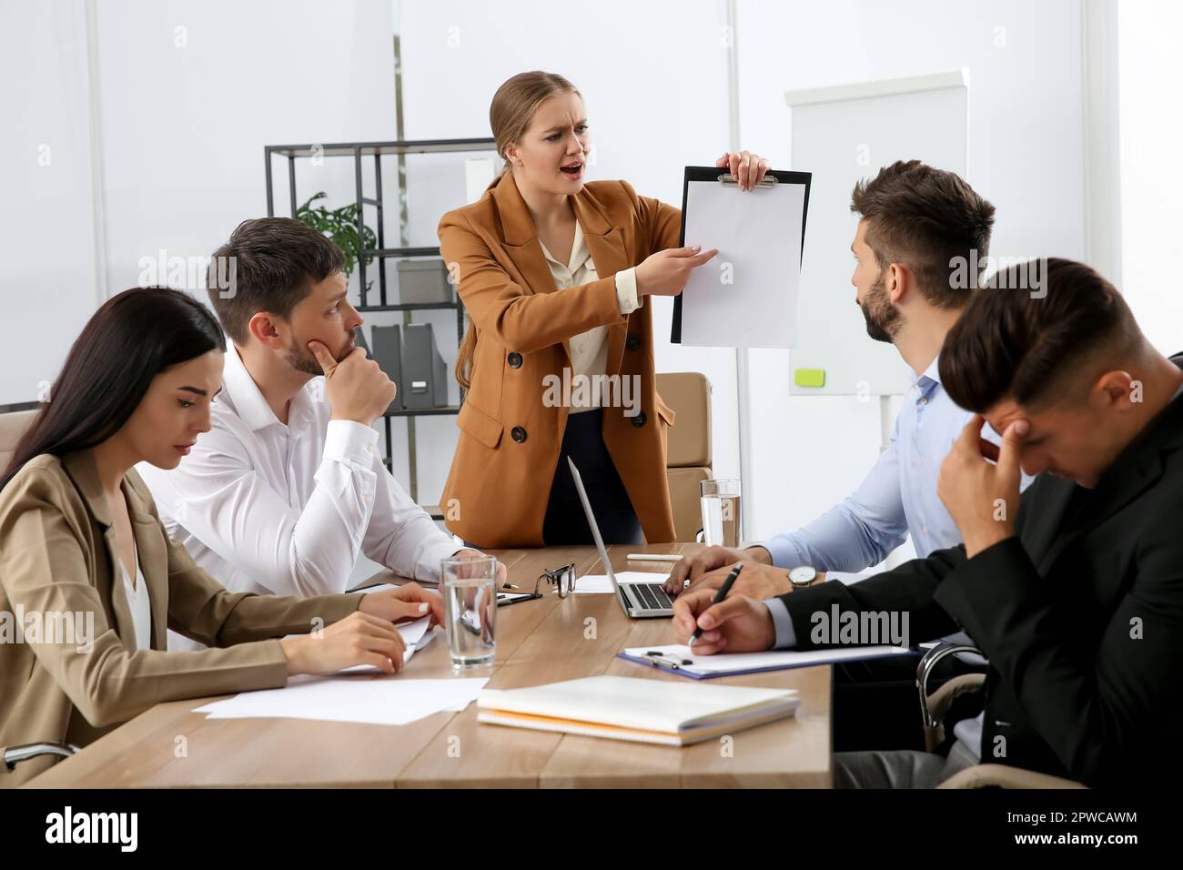 Boss screaming at employees in office. Toxic work environment Stock ...