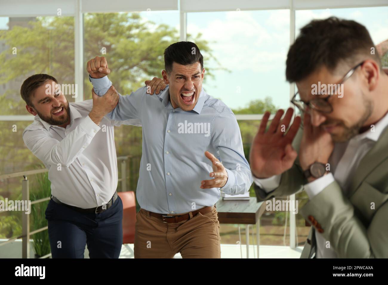 Colleagues arguing workplace disagree hi-res stock photography and ...