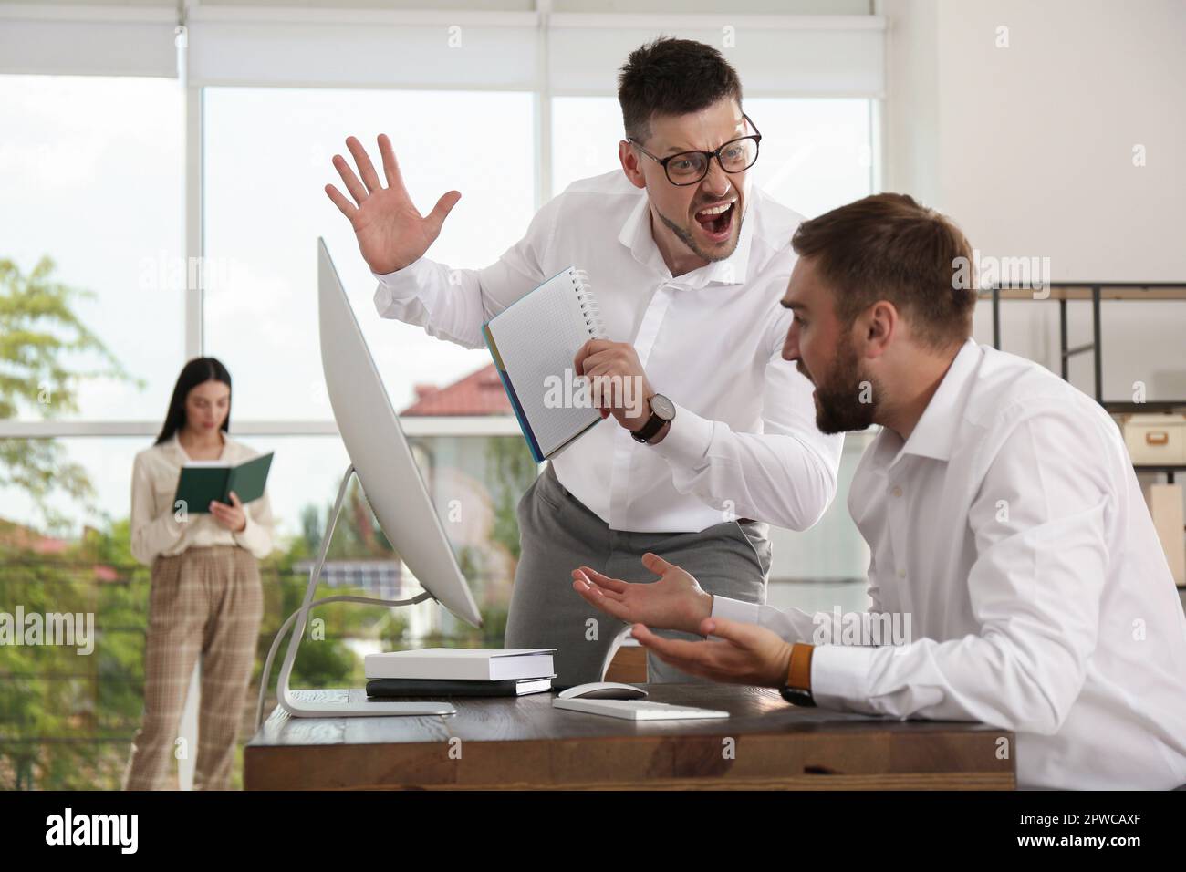 Boss screaming at employee in office. Toxic work environment Stock ...