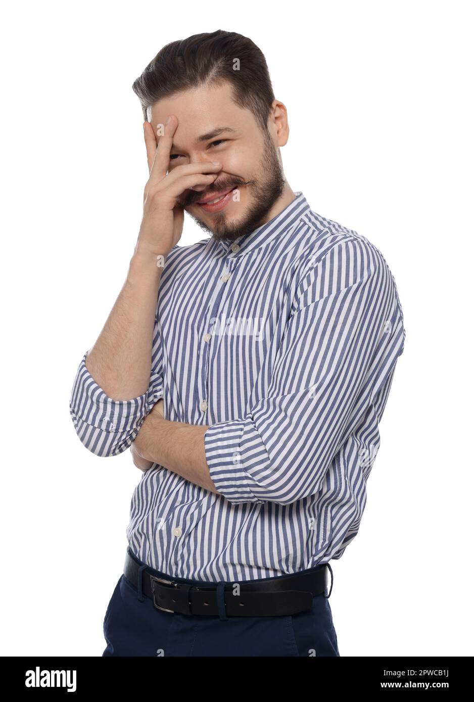 Embarrassed man covering face with hand on white background Stock Photo ...
