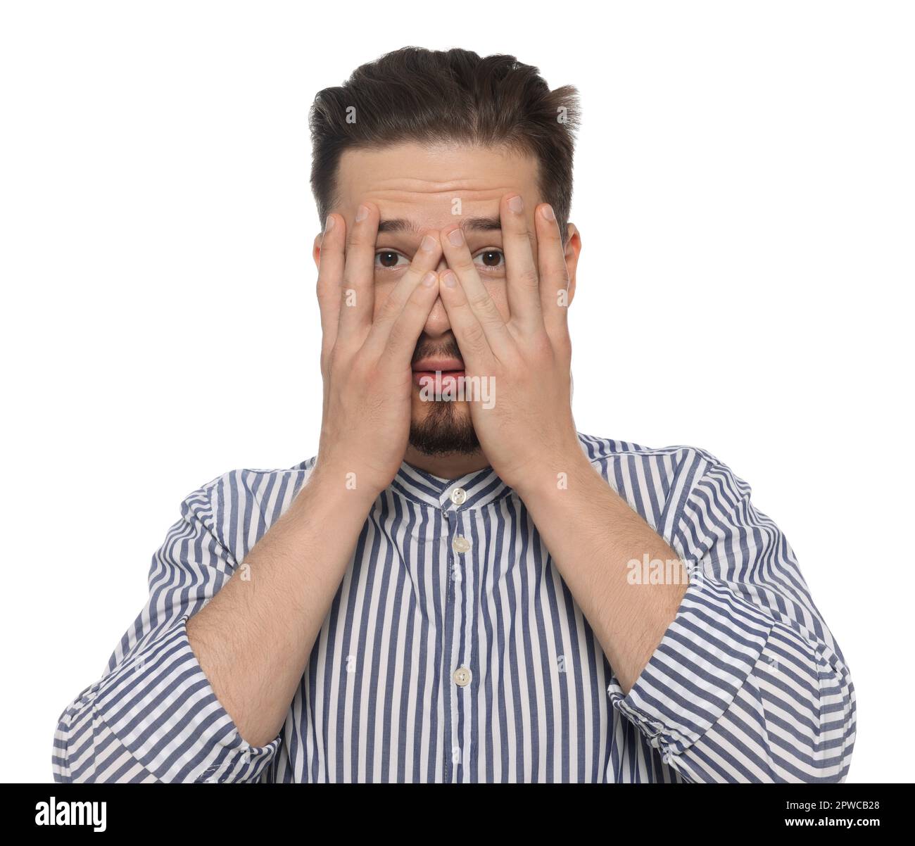 Embarrassed Man Covering Face With Hands On White Background Stock