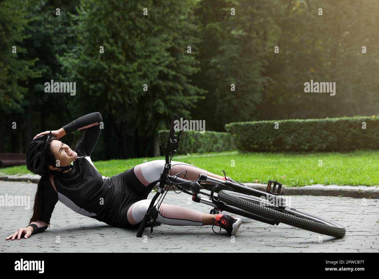Woman fallen off her bicycle hi-res stock photography and images - Alamy