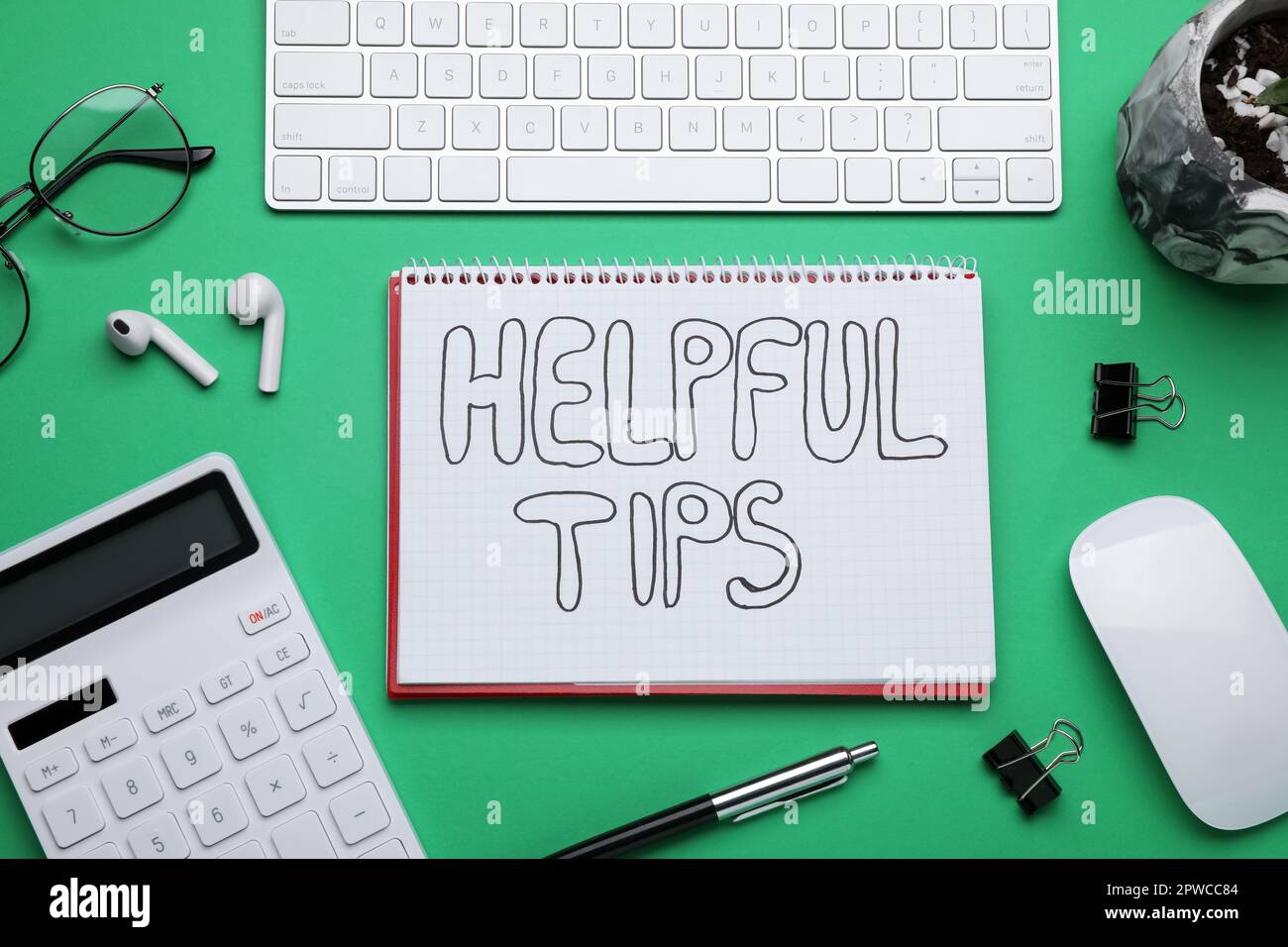 Helpful Tips. Flat lay composition with notebook, calculator and ...