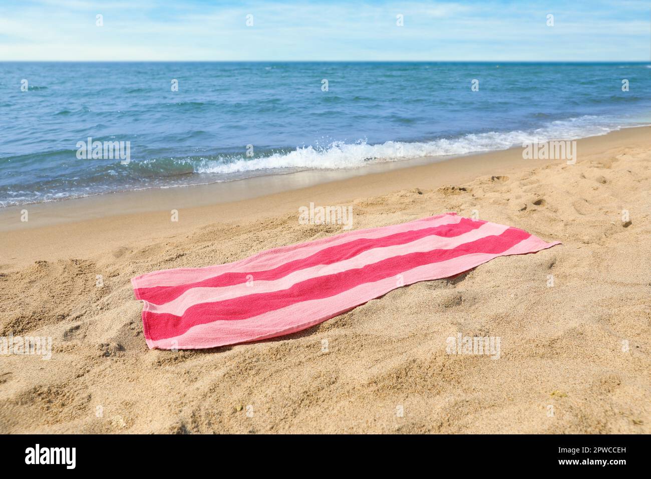 Towel on beach hi-res stock photography and images - Alamy