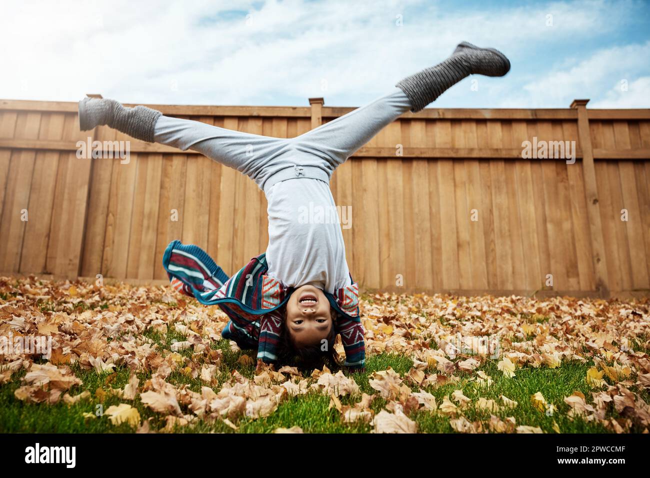 When autumn comes so does the leaf crunching fun. an adorable little ...