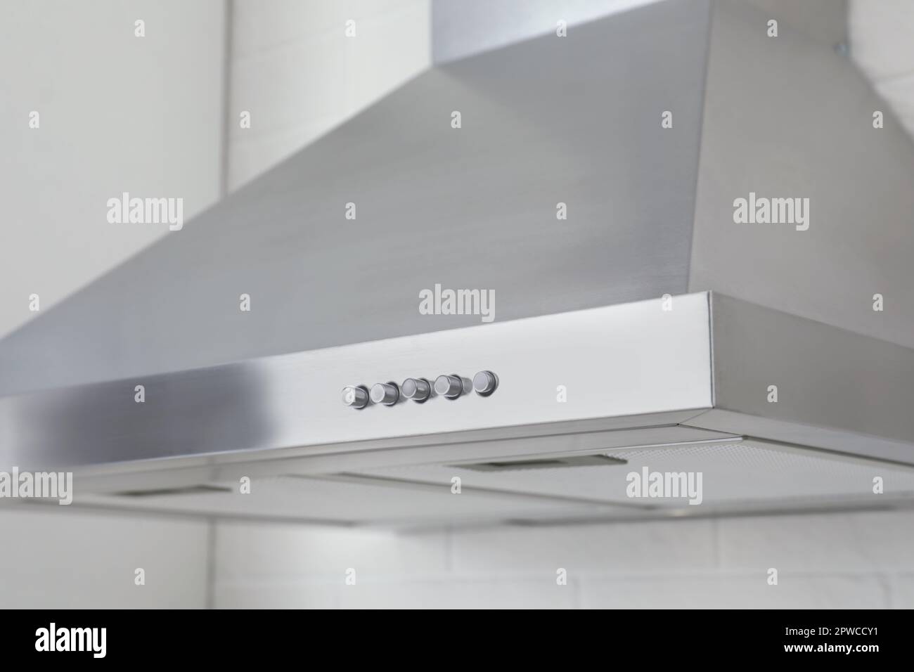 Modern range hood in kitchen, closeup view Stock Photo - Alamy
