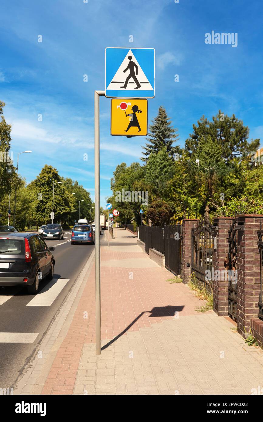Different road signs outdoors on sunny day Stock Photo - Alamy