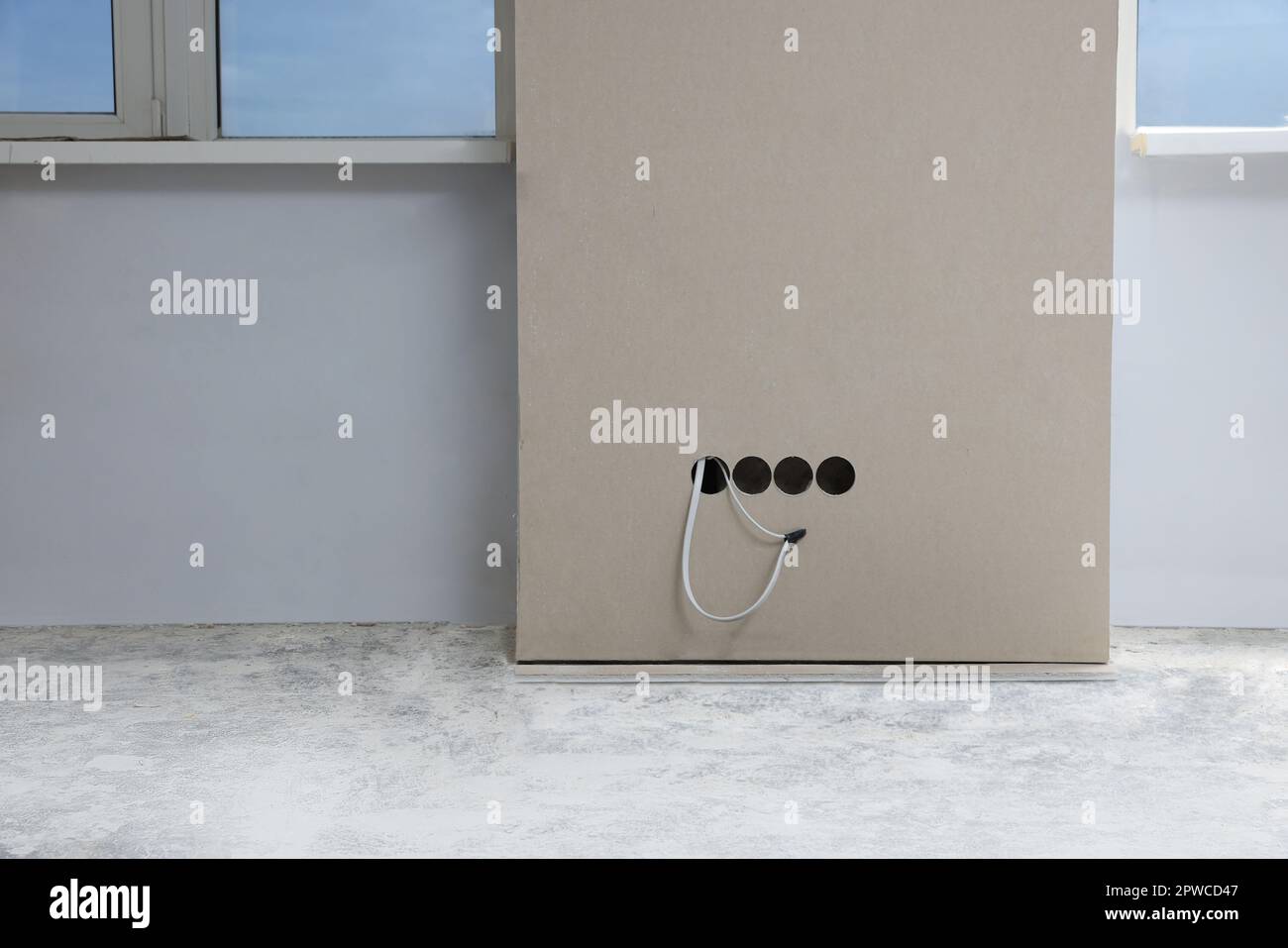 Holes for socket in wall preparing to renovation Stock Photo - Alamy