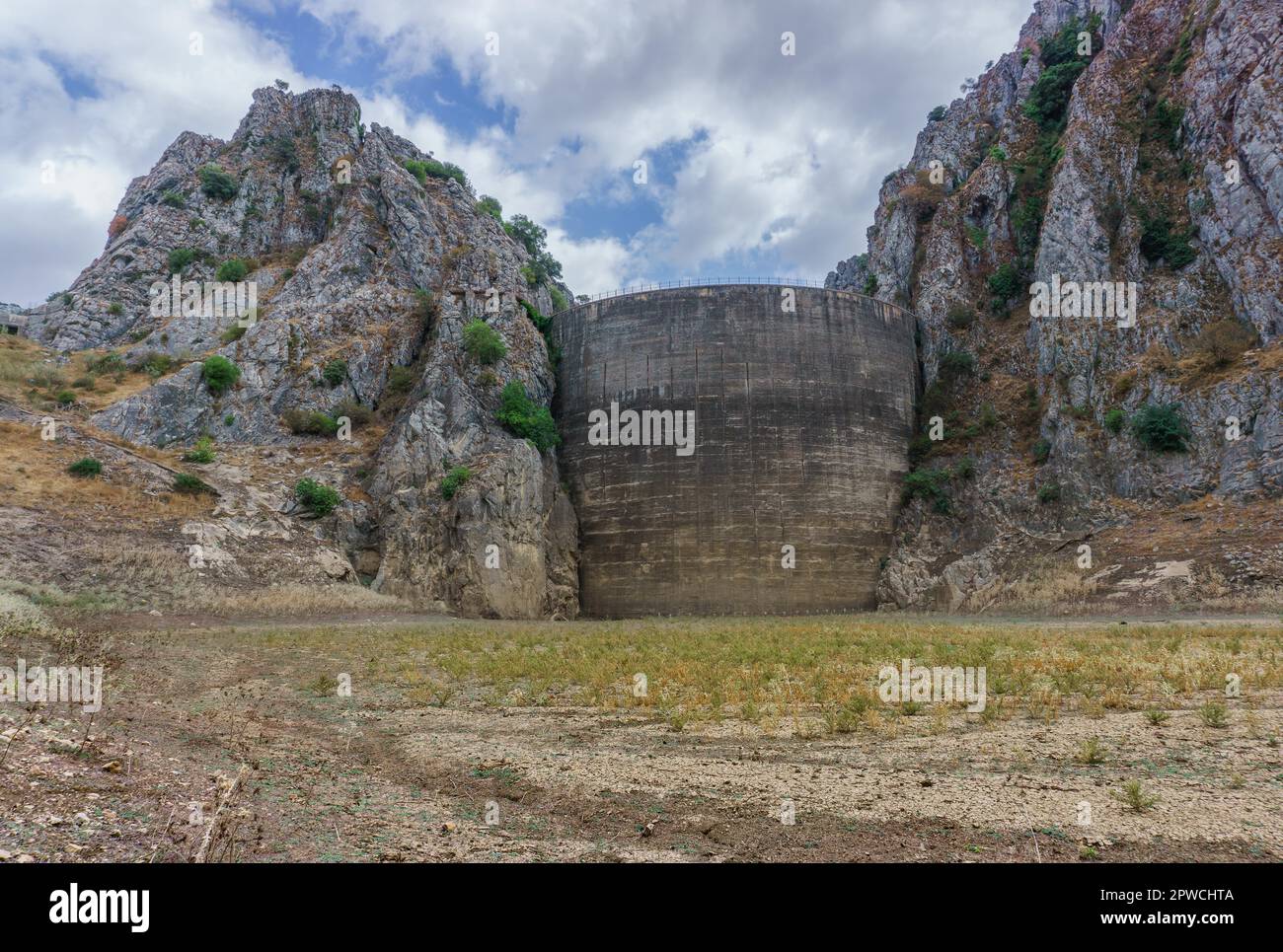 This striking photograph depicts a reservoir dam during a severe ...