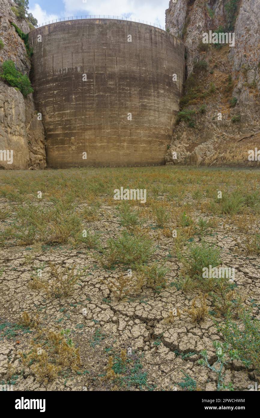This striking photograph depicts a reservoir dam during a severe ...