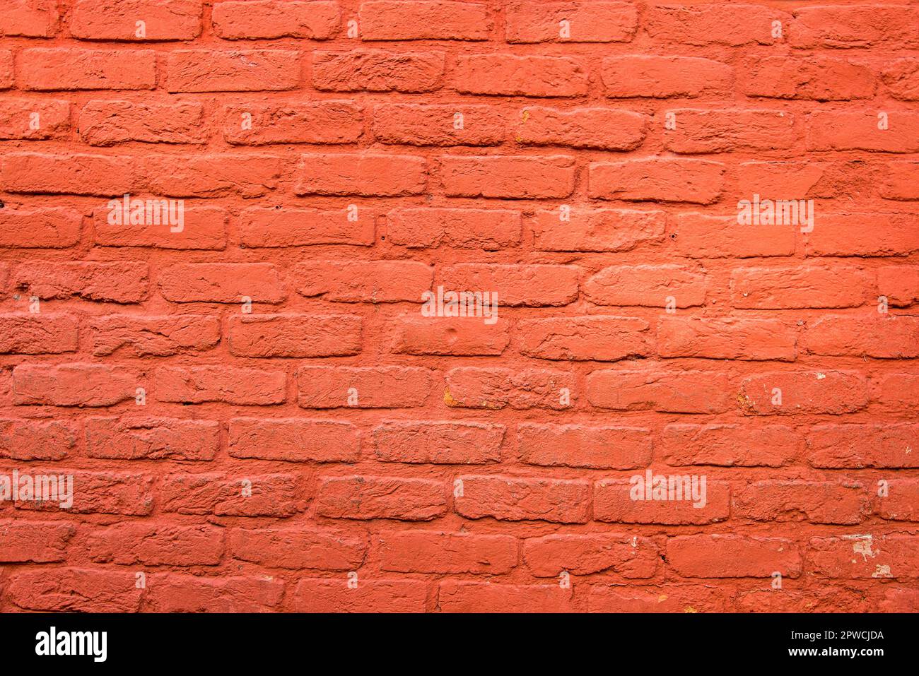 Background from a red painted brick wall Stock Photo - Alamy