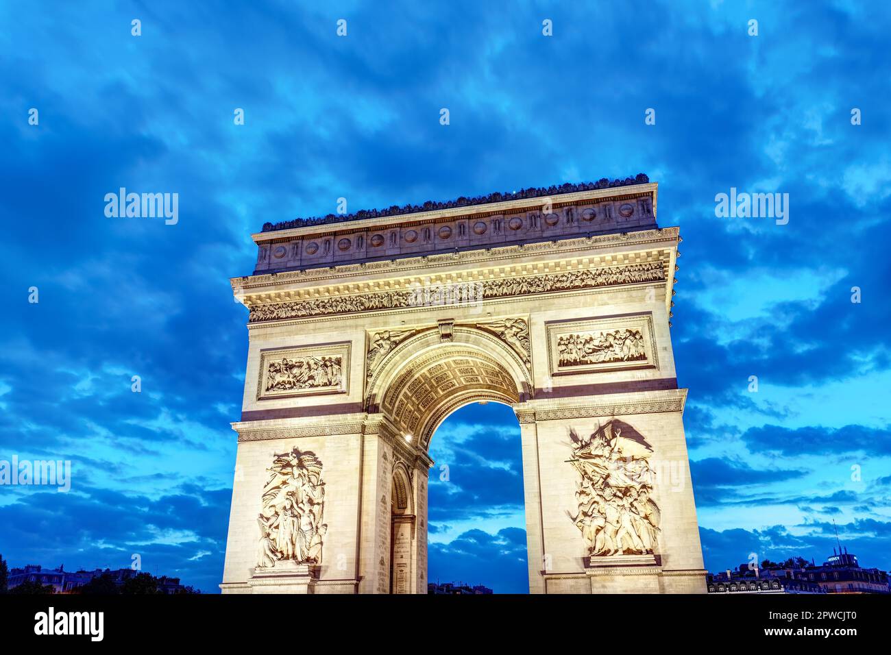 The famous Arc de Triomphe in Paris, France, by night Stock Photo - Alamy