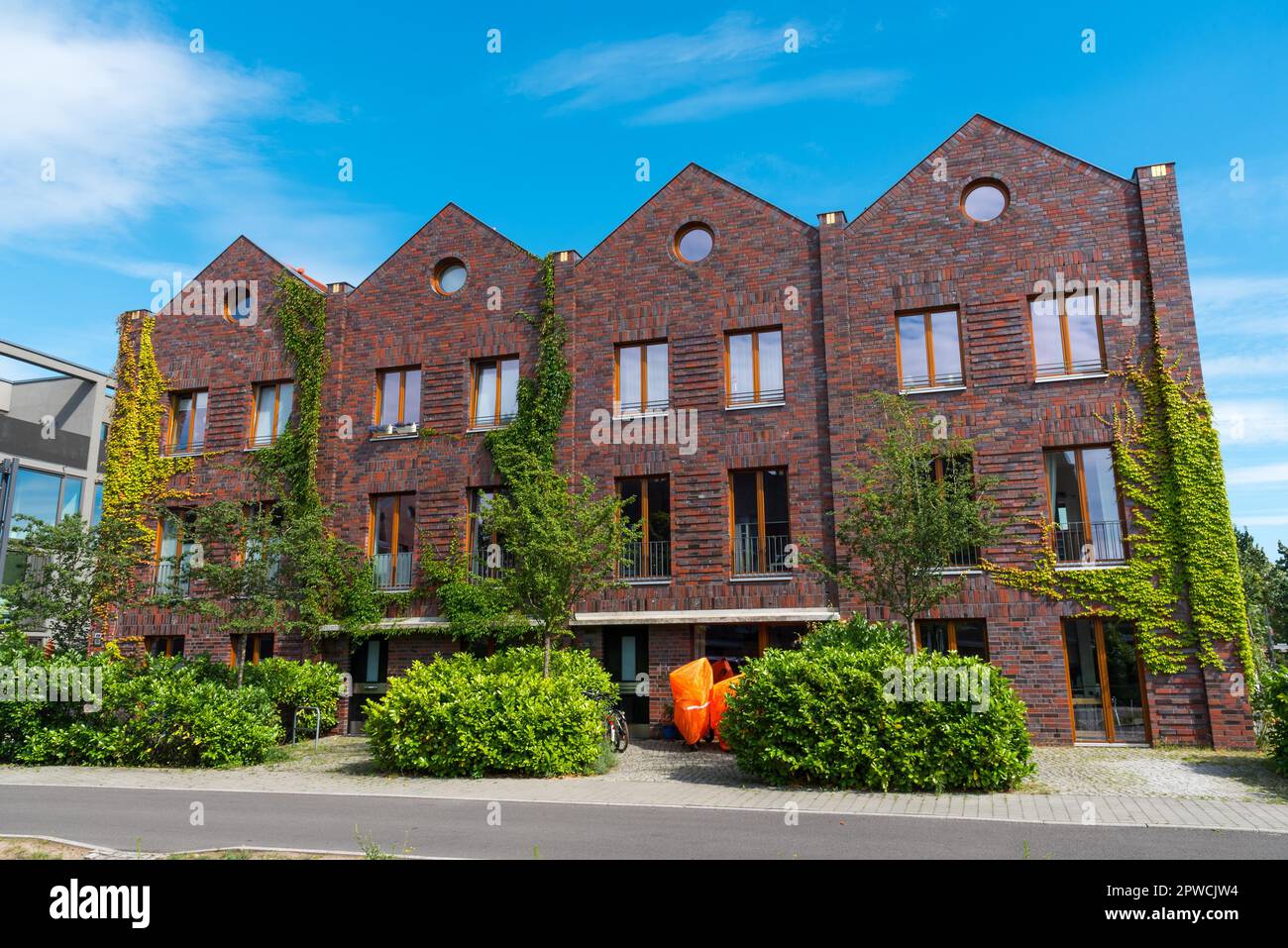 Row houses made of red brick seen in Berlin, Germany Stock Photo - Alamy