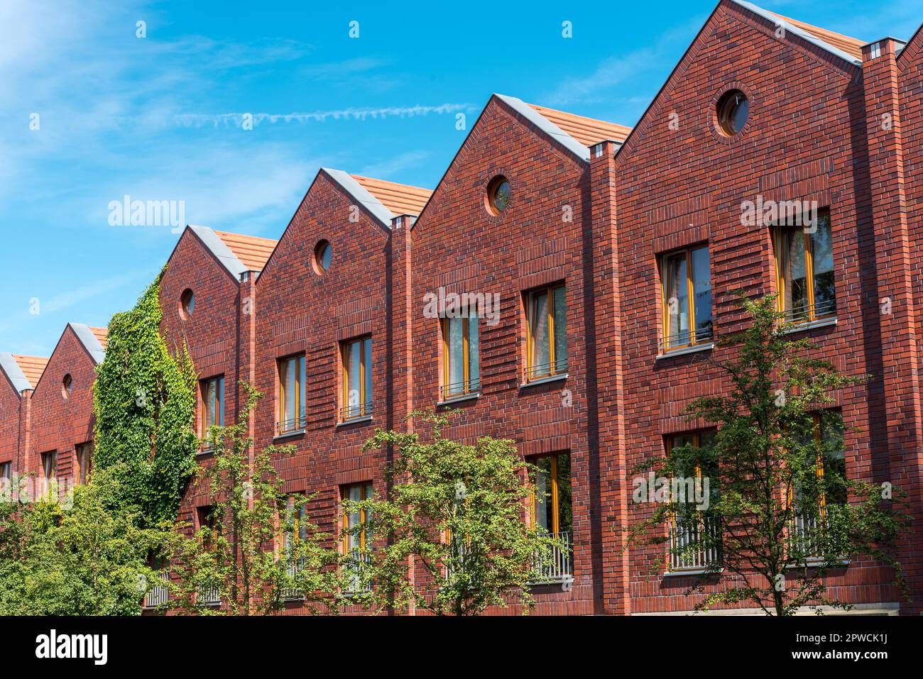 Row houses made of red brick in Berlin Stock Photo - Alamy