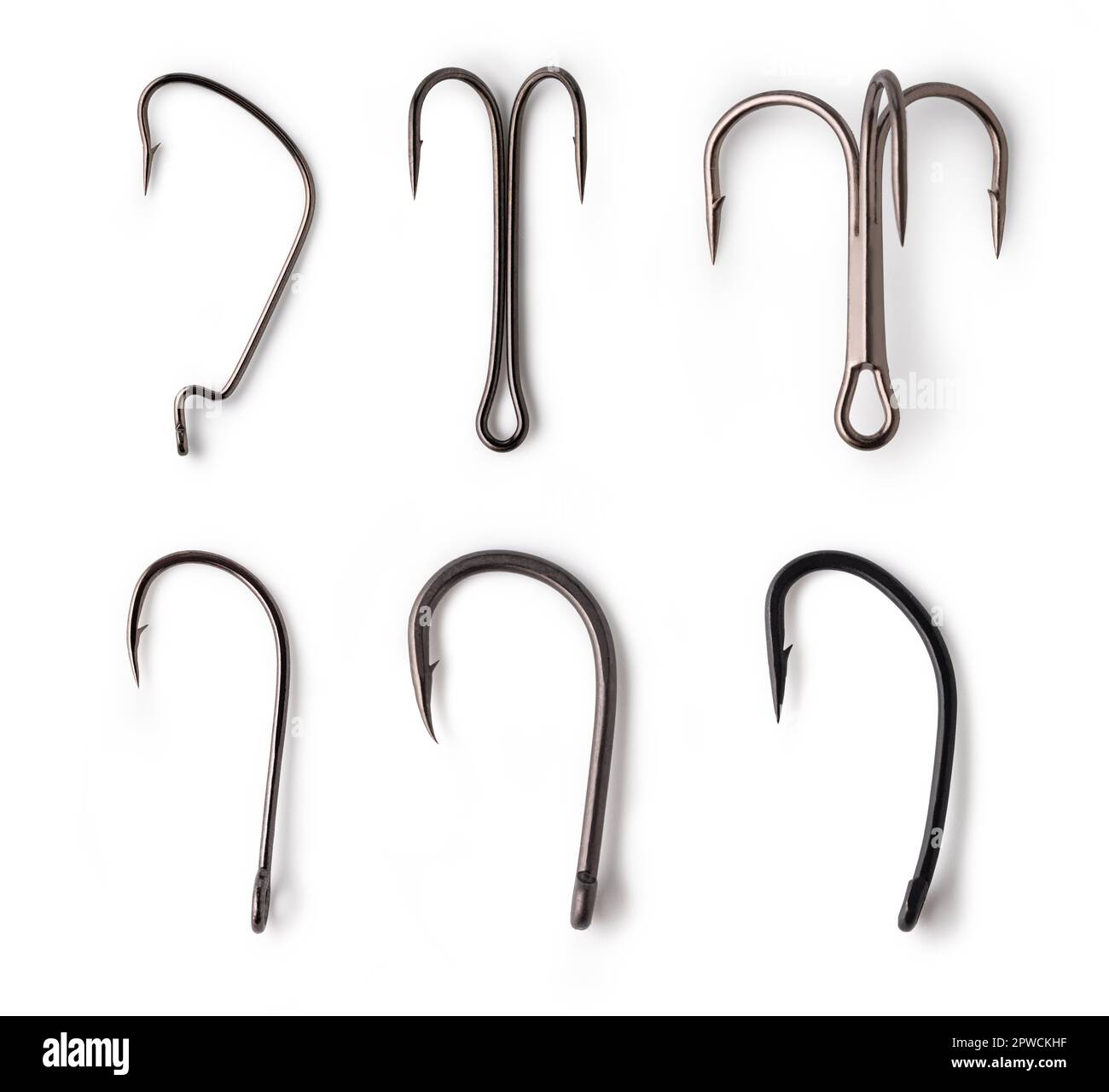 fishing hooks on a white background Stock Photo - Alamy