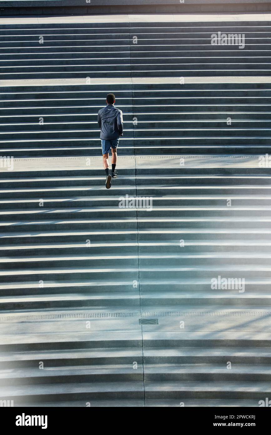 Raising the standard. Full length shot of a handsome young sportsman ...