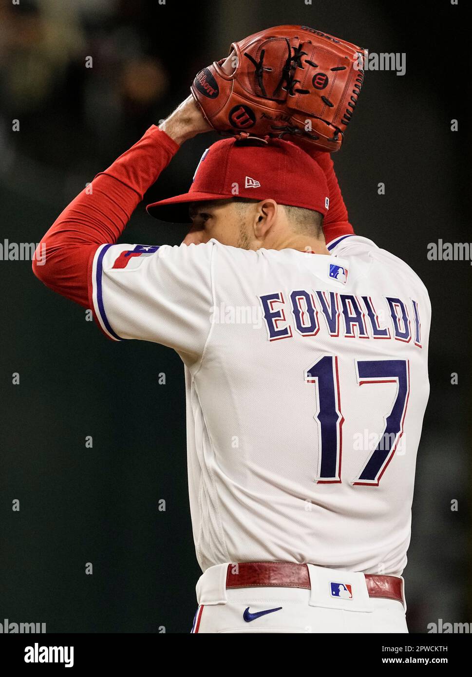 Texas Rangers starting pitcher Nathan Eovaldi (17) prepares to throw during the ninth inning of ...