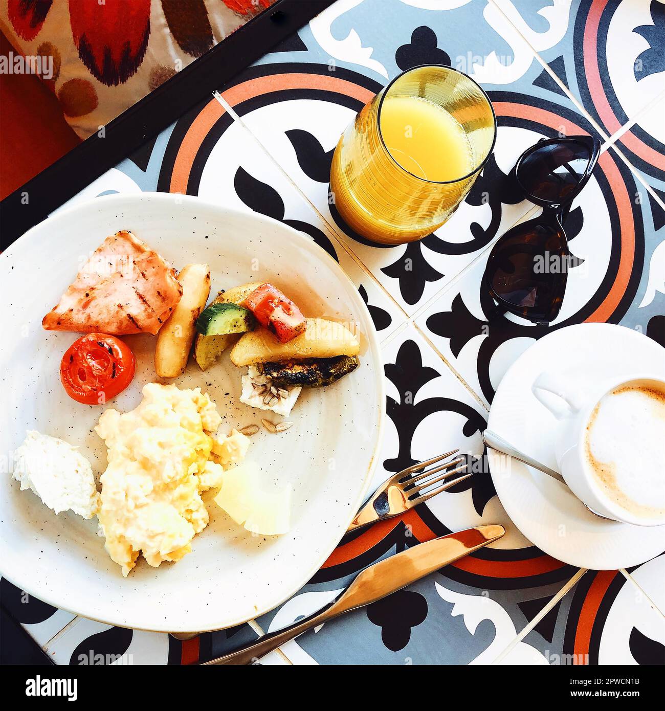 High angle of healthy delicious breakfast in cafe, omelet with bacon ...
