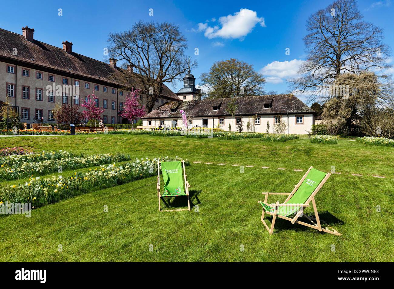 Two deck chairs in the Remtergarten, Corvey Monastery, sunny spring ...