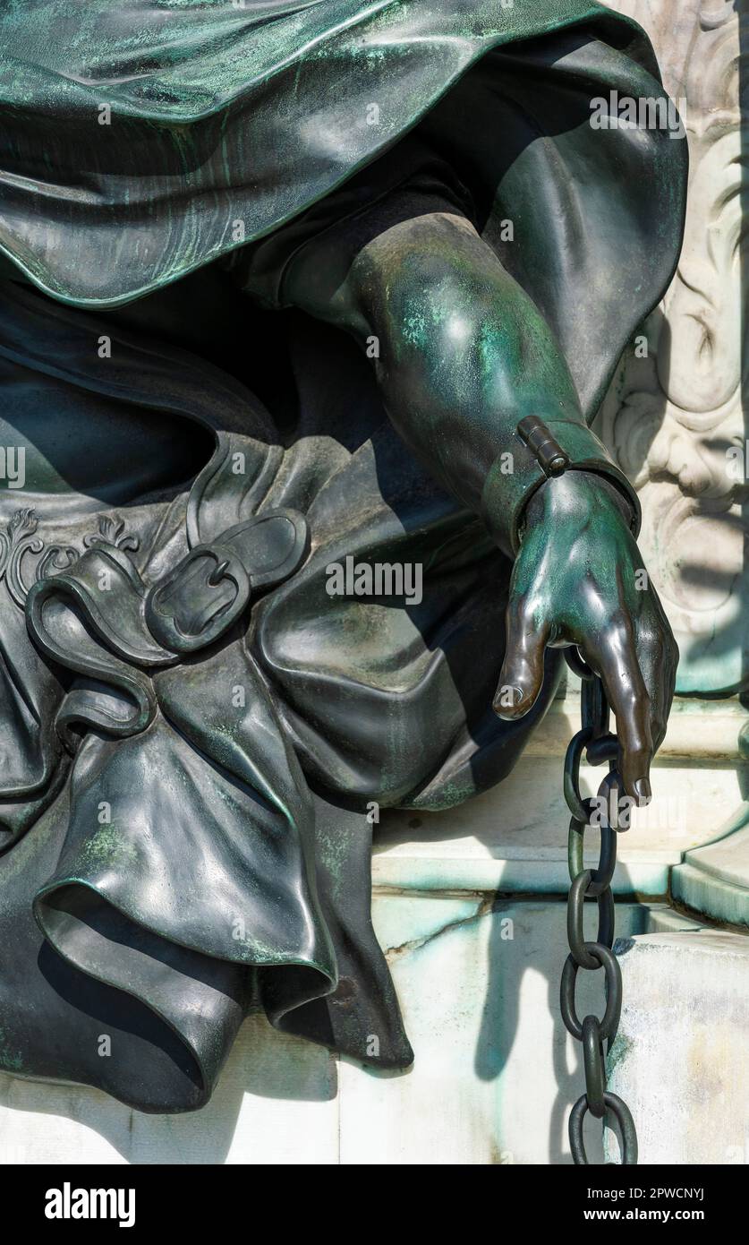 Detail photo of the chained warriors at the base of the equestrian ...