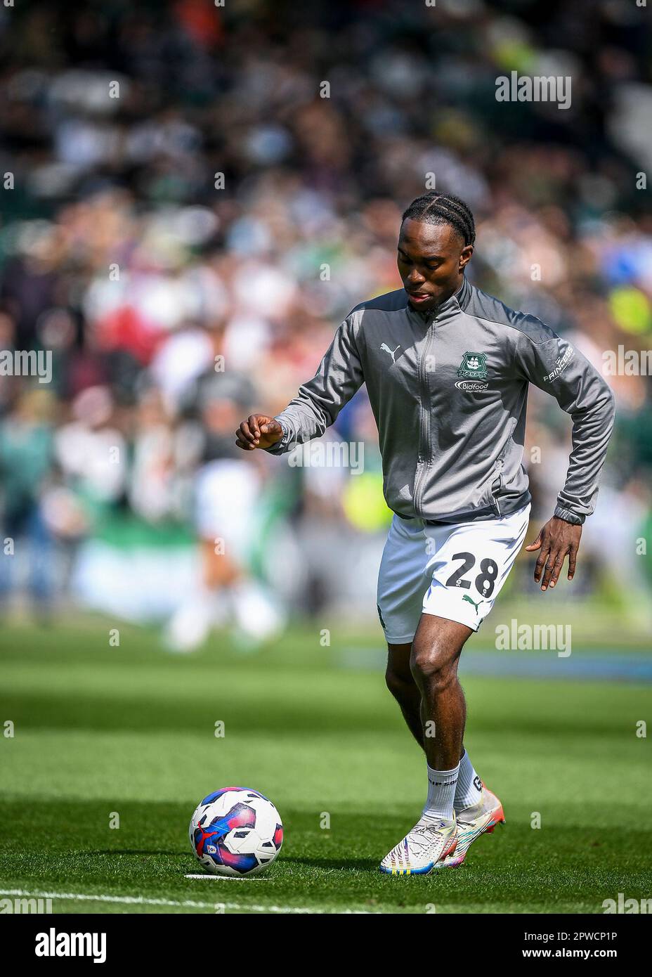 Jay Matete #28 of Plymouth Argyle warming up during the Sky Bet League ...