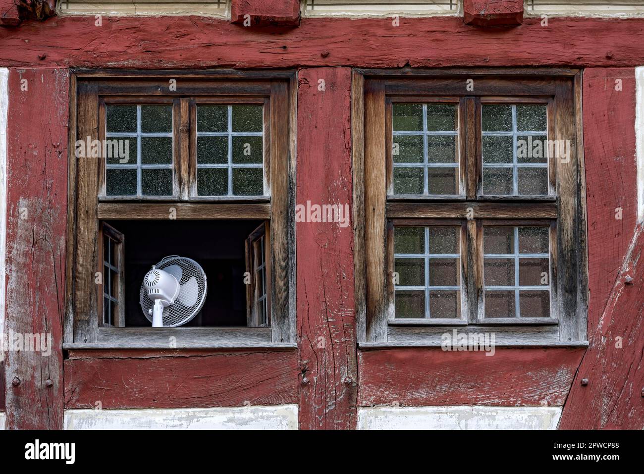 Window with fan to cool the room in hot weather, wooden beams, official ...