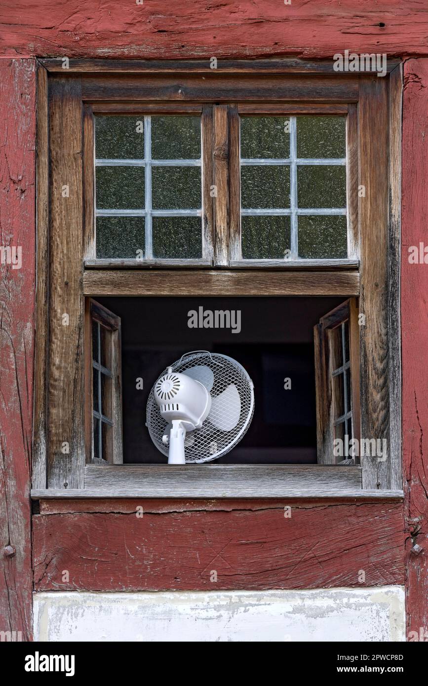 Window with fan to cool the room in hot weather, wooden beams, official ...