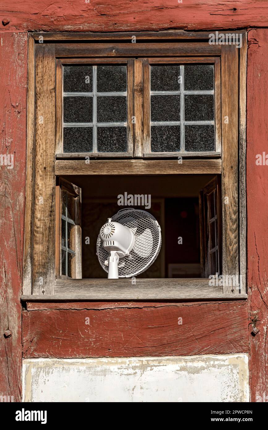 Window with fan to cool the room in hot weather, wooden beams, official ...