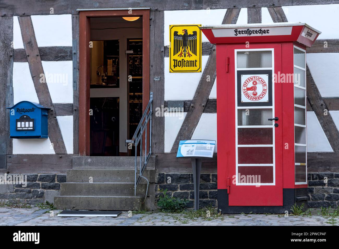 Telephone box, public telephone, historical post office, house from ...