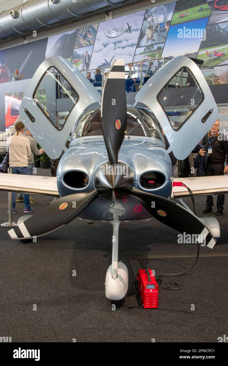 The front part of the aircraft with the propeller, with silver engine ...