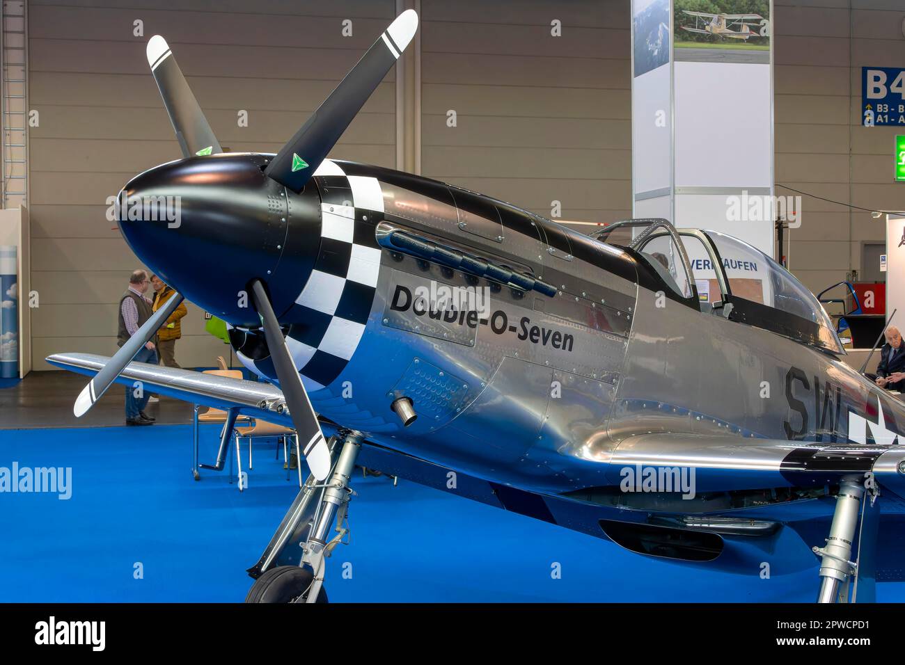 The front part of the aircraft with the propeller with engine cowling ...