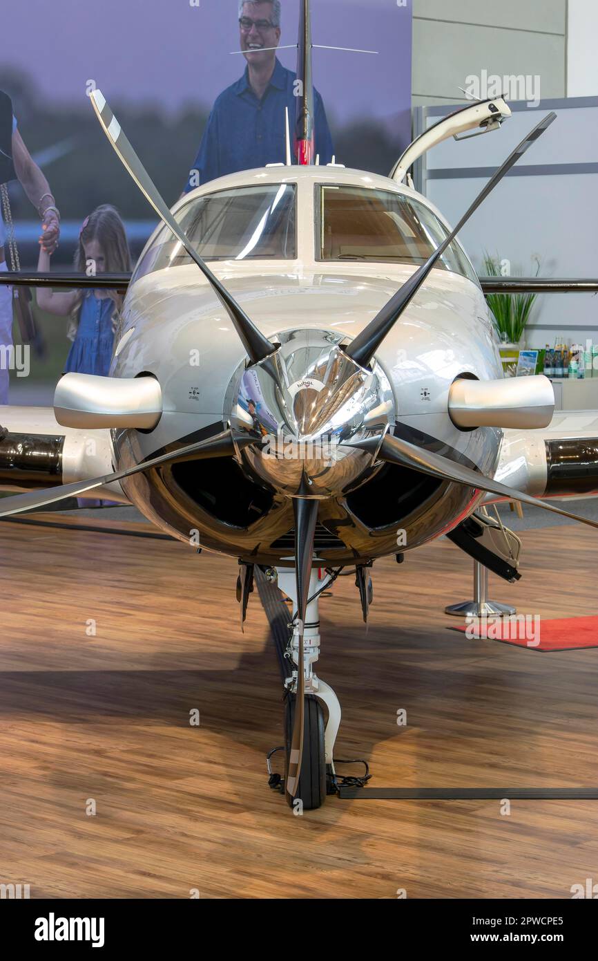 The front part of the aircraft with the propeller, with silver engine ...