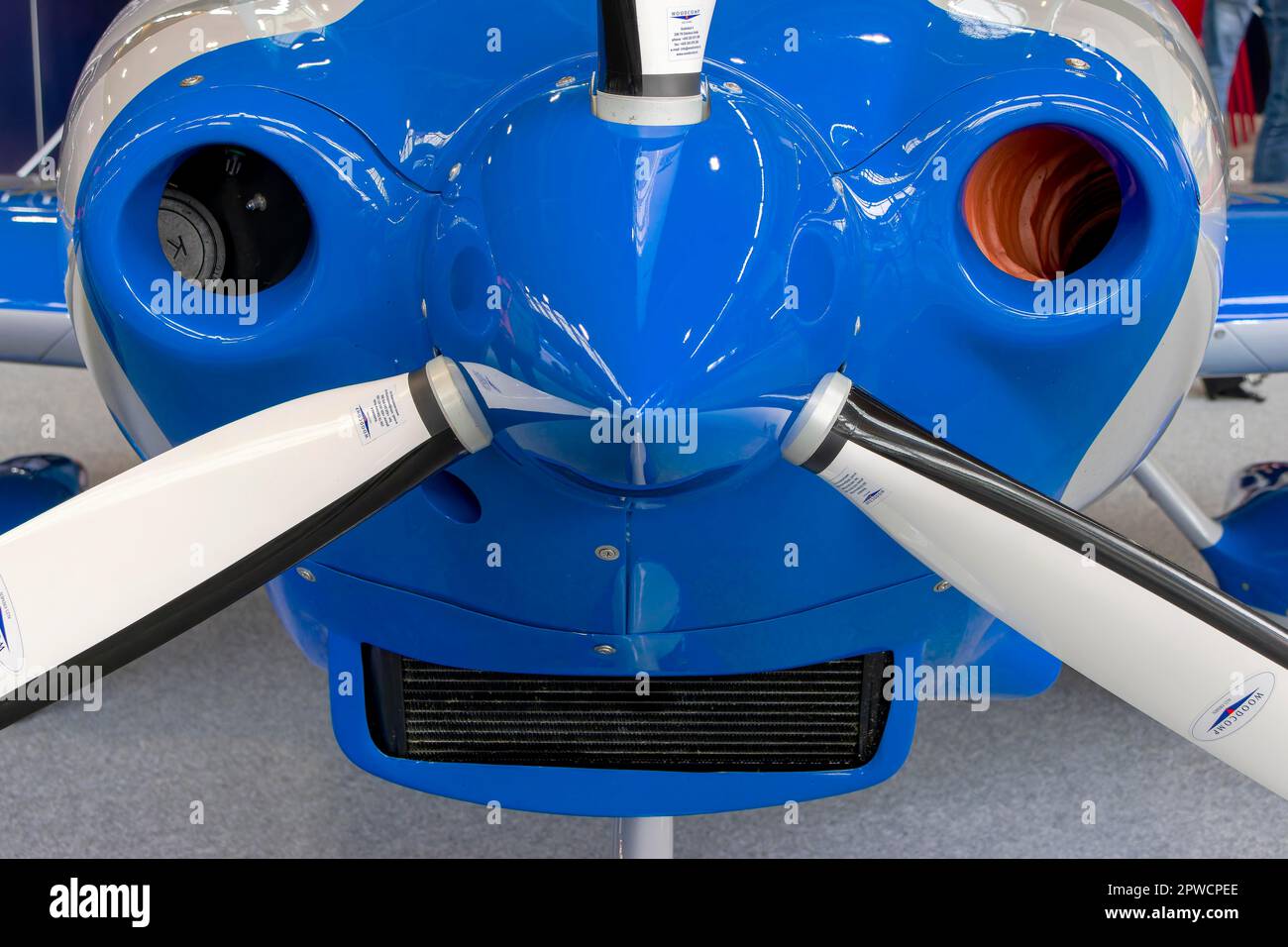 The front part of the aircraft with the propeller, with blue engine ...