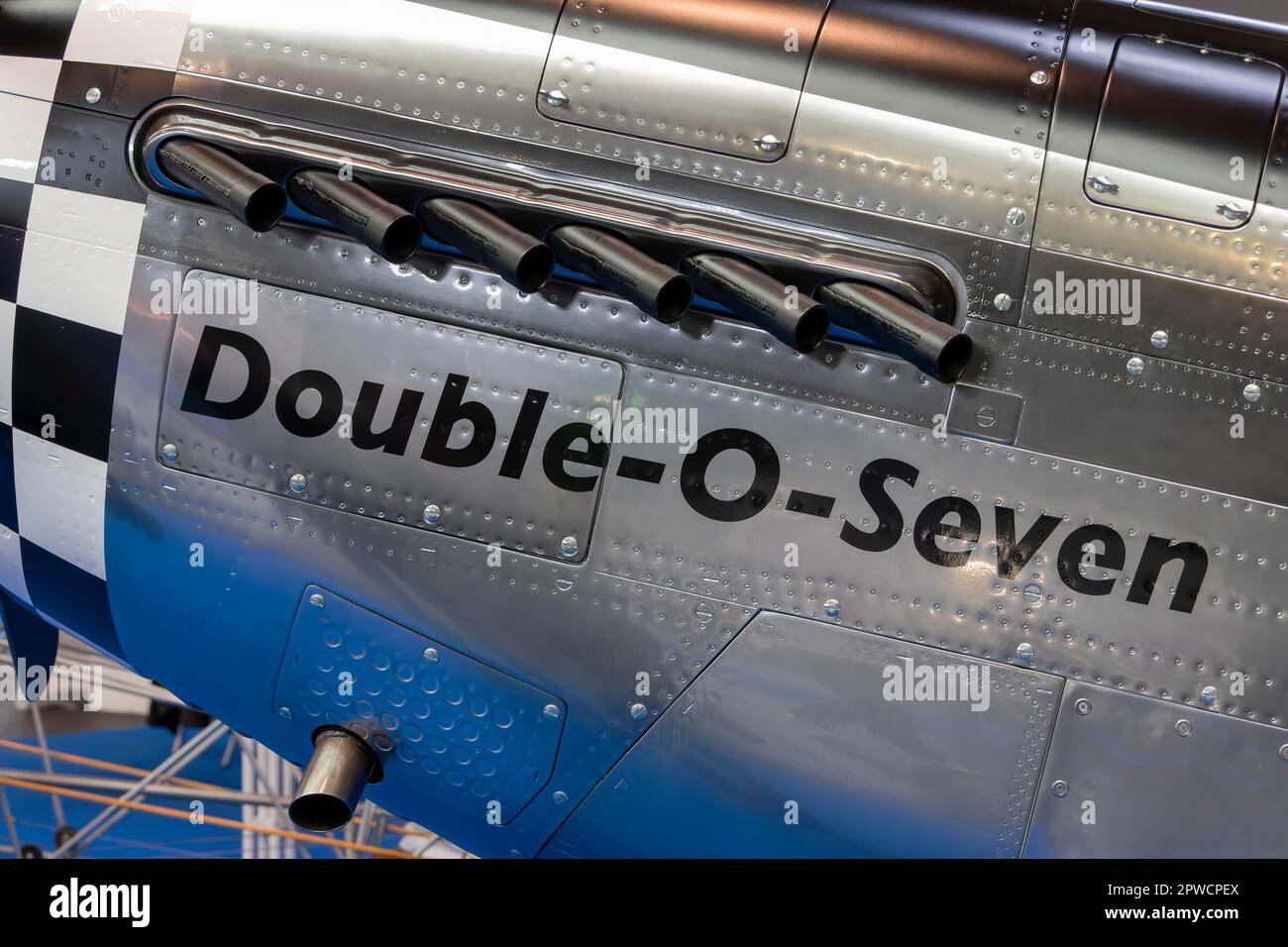 The front part of the aircraft with bonnet, 6 exhaust and the inscription Double-O-Seven ...