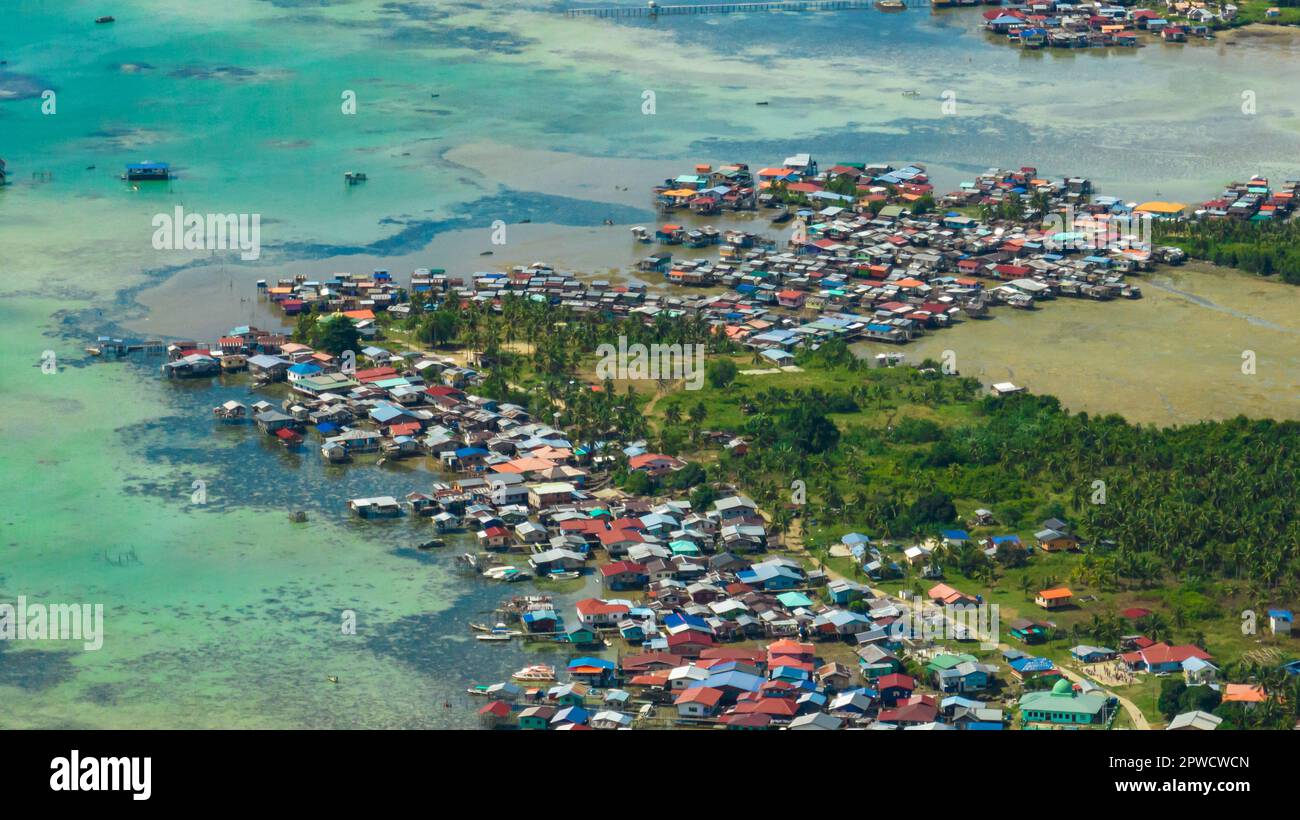 Traditional houses of fishermen and farmers on the water view from ...