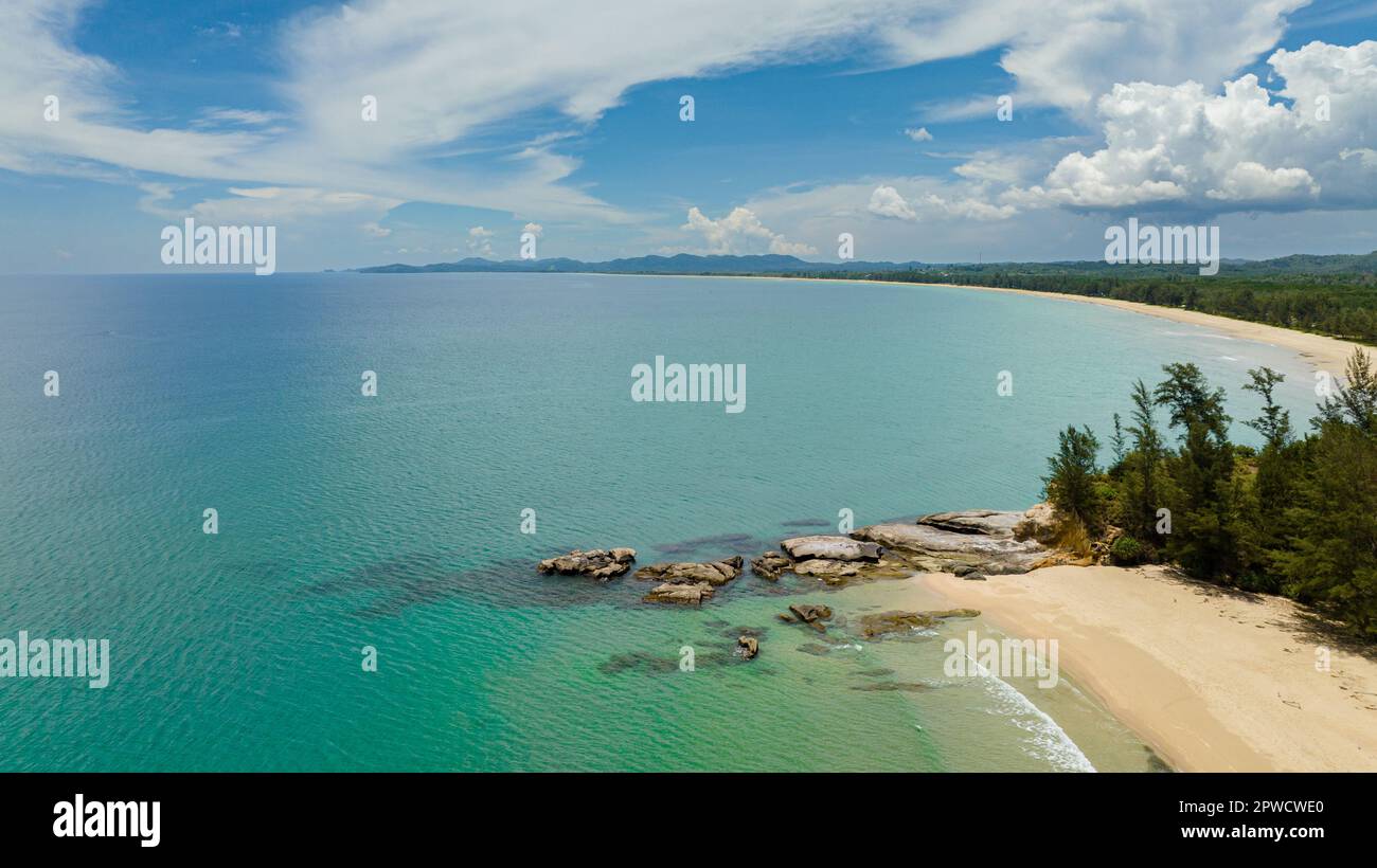 Wide sandy beach with ocean surf and waves. Borneo, Malaysia. Tindakon ...