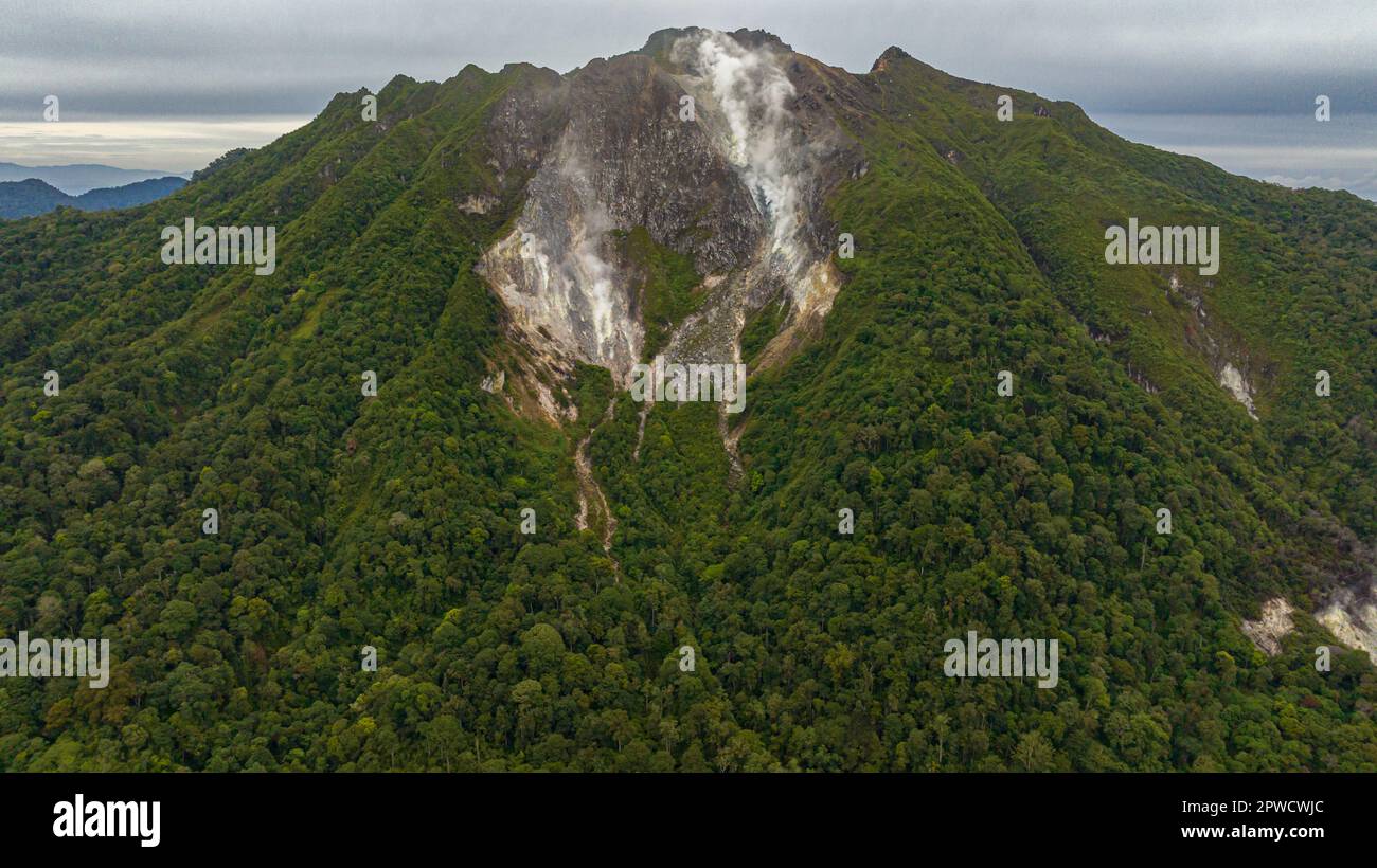 Aerial view of slope of Sibayak volcano with volcanic activity and ...