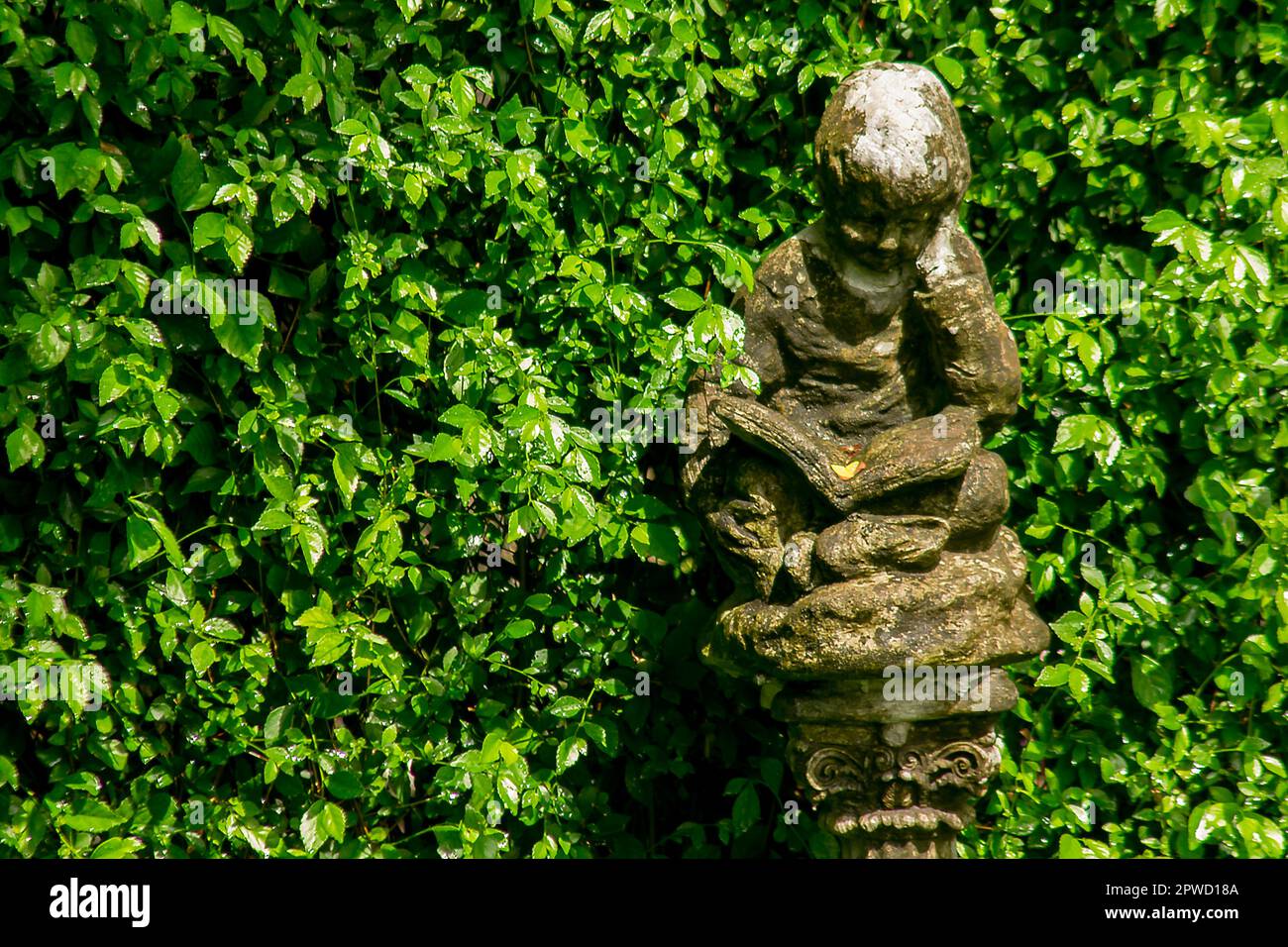 Old statues in the garden Stock Photo - Alamy