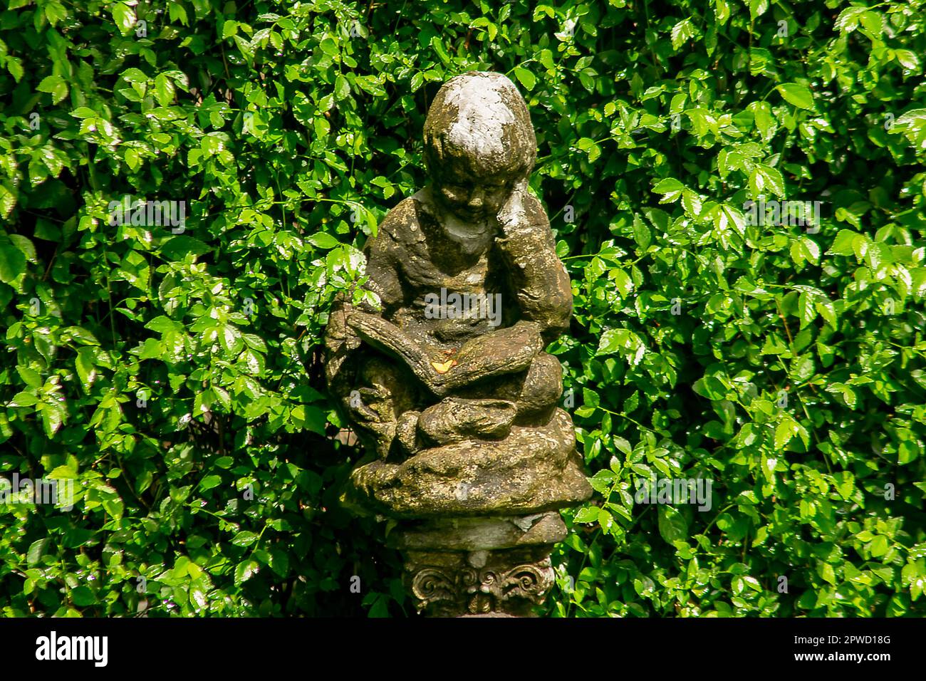 Old statues in the garden Stock Photo - Alamy