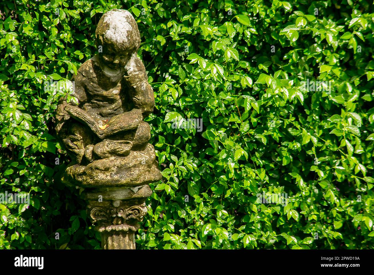 Old statues in the garden Stock Photo - Alamy