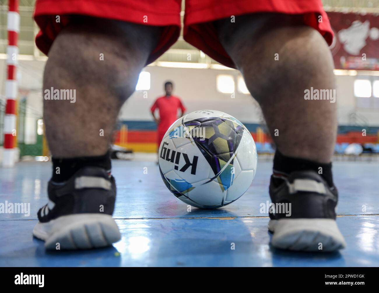 Gaza, Palestine. 29th Apr, 2023. A ball and legs of a short-statured ...