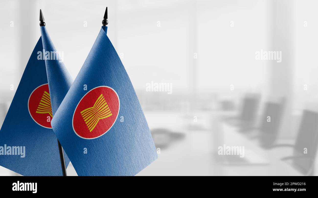 Small flags of the ASEAN on an abstract blurry background Stock Photo ...