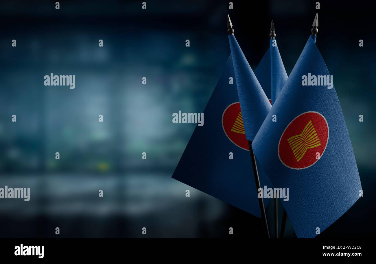 Small flags of the ASEAN on an abstract blurry background Stock Photo ...
