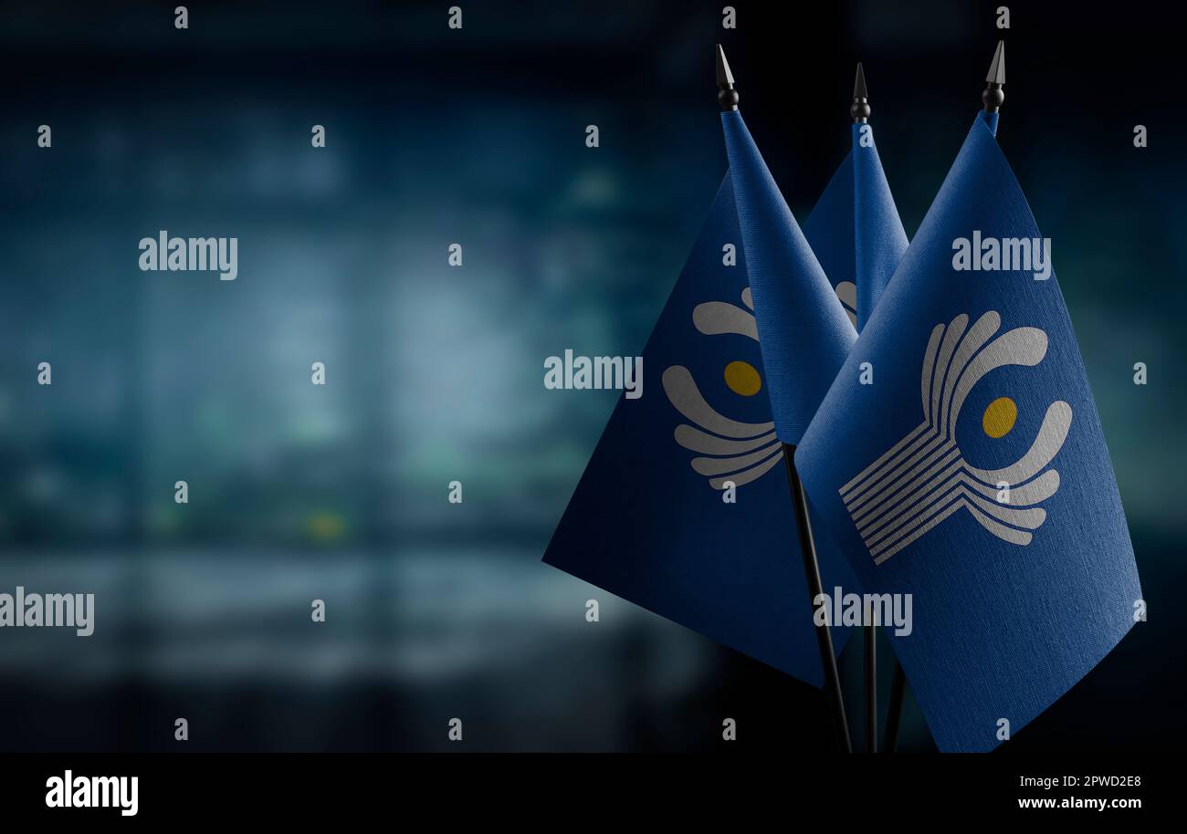 Small flags of the CIS on an abstract blurry background Stock Photo - Alamy