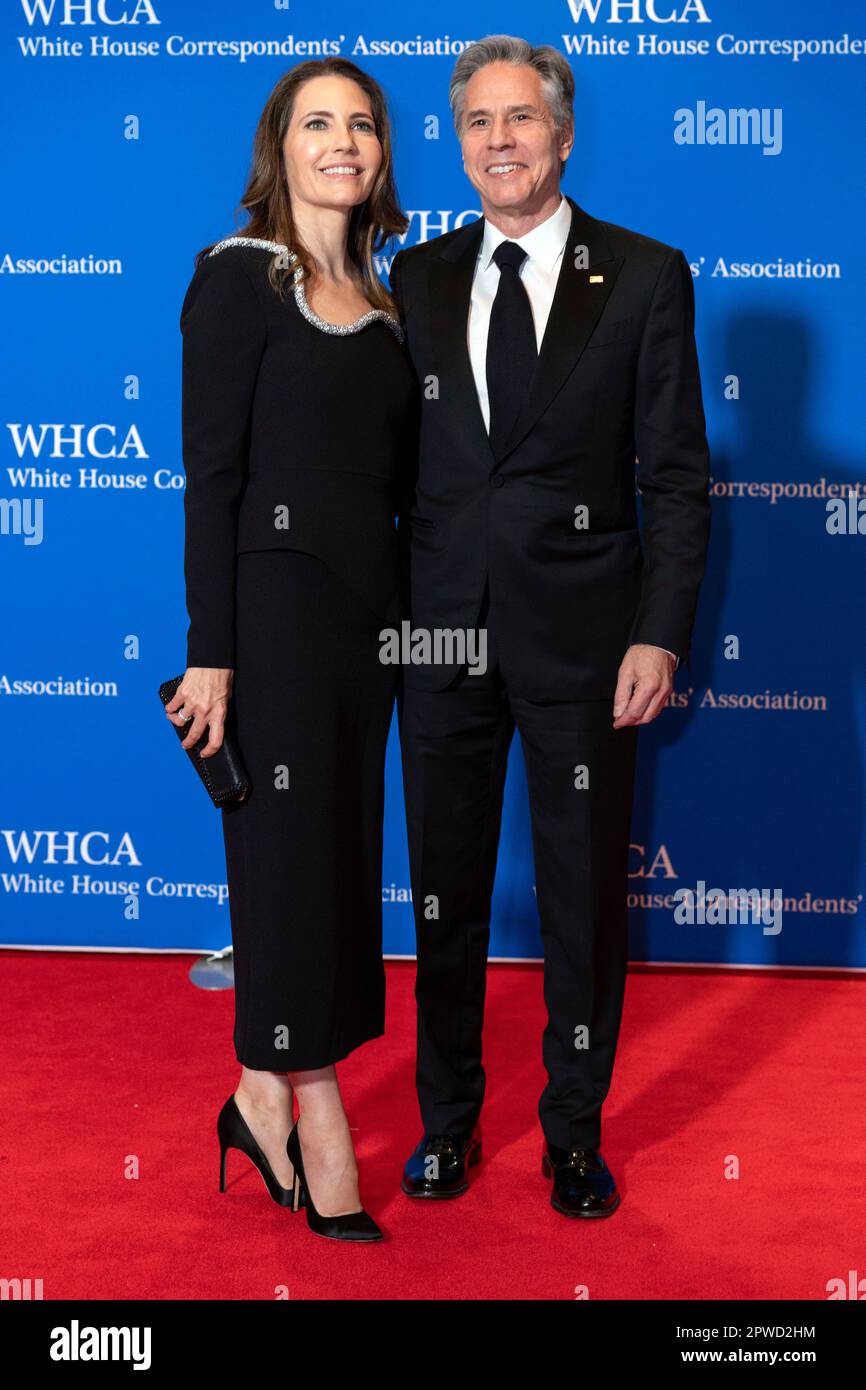 Secretary of State Antony Blinken and his wife Evan Ryan pose for ...