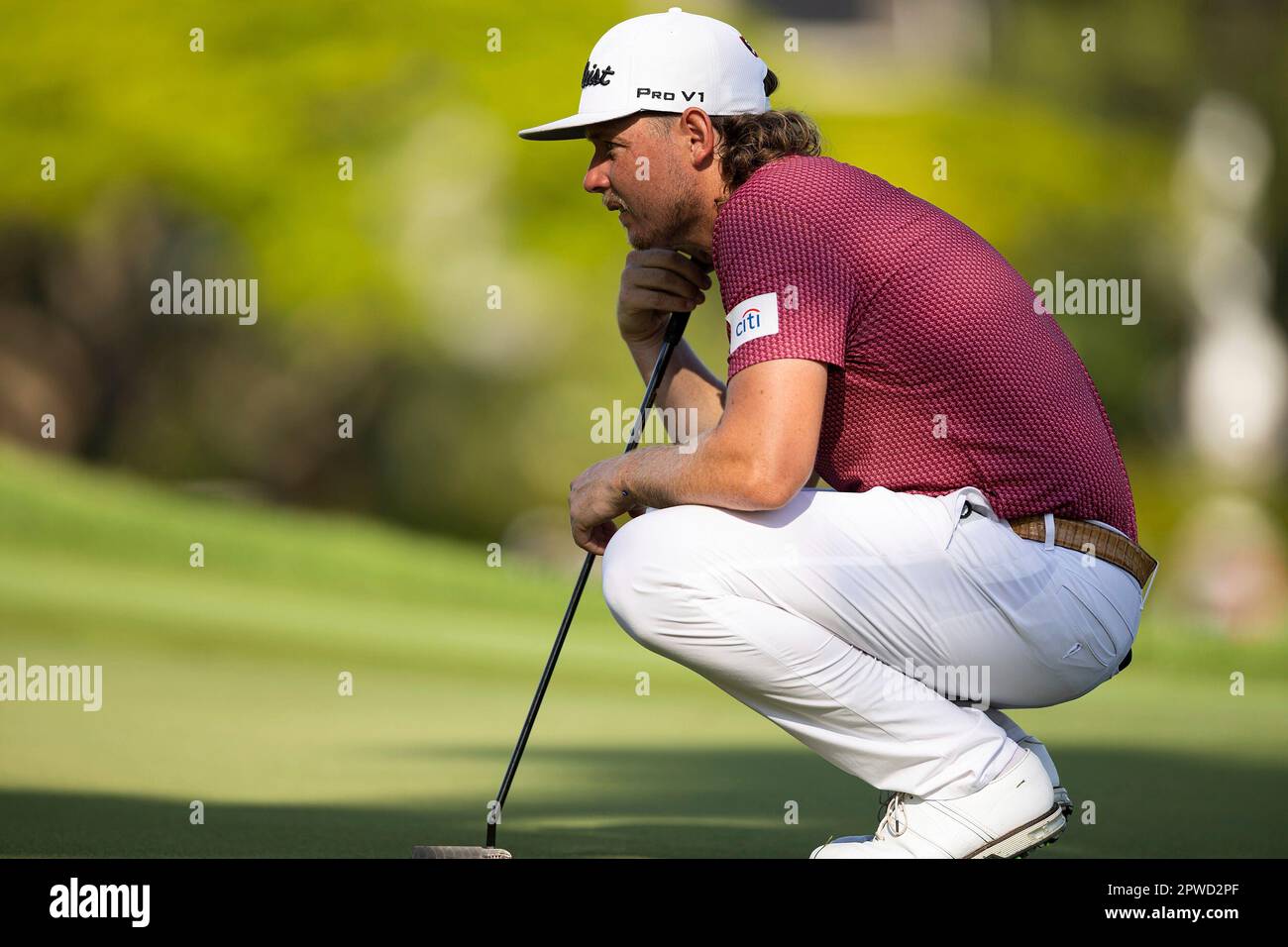 Captain Cameron Smith of Ripper GC reads his putt on the fourth green ...