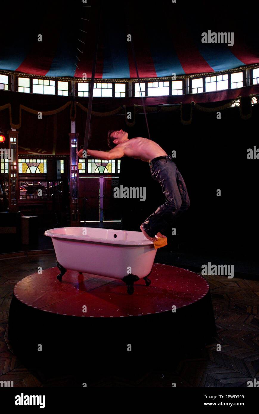German bathtub acrobat David O’Mer of the La Clique (burlesque cabaret ...