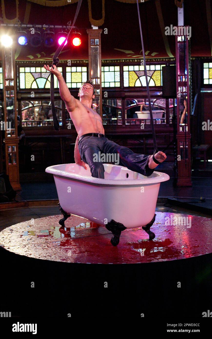 German bathtub acrobat David O’Mer of the La Clique (burlesque cabaret ...